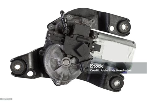 와이퍼 메커니즘 전기 모터 브러쉬를 제자리에 반환하는 감속기와 레버 및 브러시 자체와 함께 유리에 물을 공급하는 와셔로 작동합니다 전기 모터에 대한 스톡 사진 및 기타