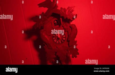 Scary Cuckoo Clock Going Off With Shifting Red Light And Shadows For A Stock Video Footage Alamy