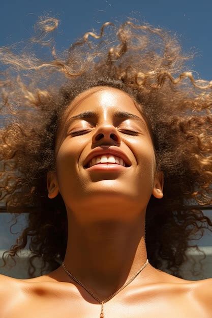Premium Photo A Woman With Curly Hair And Eyes Closed