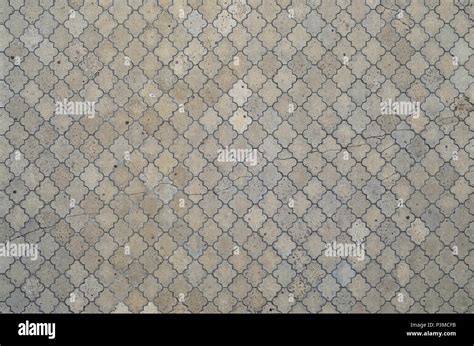 The Texture Of A Rhythmic Mosaic Made Of Concrete Tiles Background Image Of A Large Area Of Old