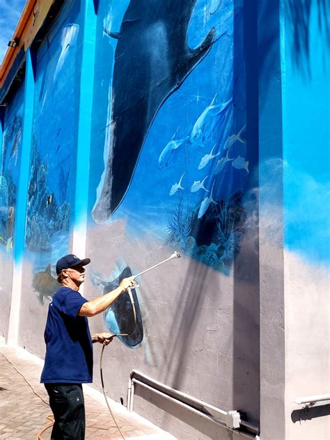 Artist Wyland Retouches Key Wests Whaling Wall