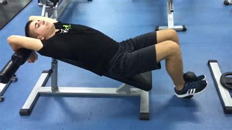 Weighted Incline Crunches