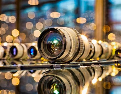 Premium Photo Light On The Glass Of Camera Lenses Reflection