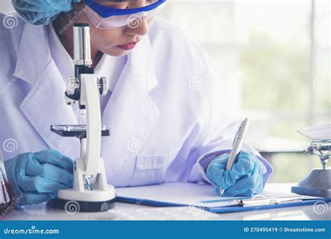 Microscope For Blood And Semen Analysis On A Black Background Laboratory Infertility Stock