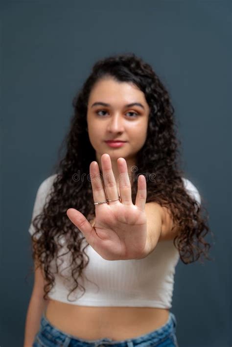 Vertical Portrait Of Young Beautiful Woman Making Stop Sign Stock Image