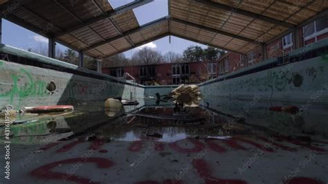 Footage Of An Abandoned Covered Swimming Pool Static Shot With