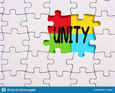 Word Unity In Chalk On Sidewalk With Hearts And Handprints Stock