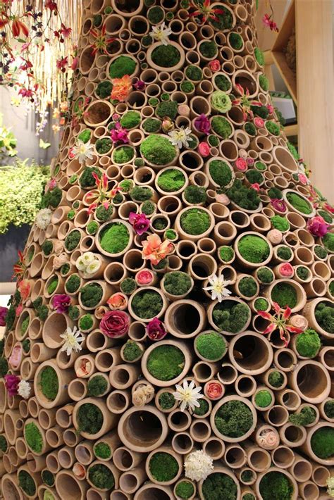 How To Make An Interesting Art Piece Using Tree Branches EHow In 2023 Green Wall Design