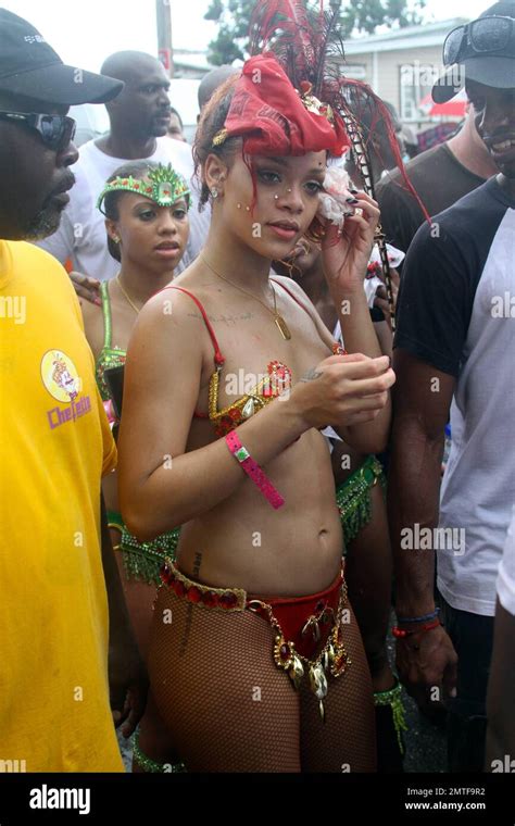 Rihanna Appears In A Parade In The Rain As She Celebrates Kadooment Day