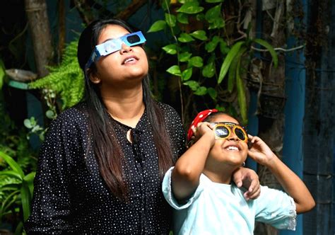 Girls Seen Wearing Eclipse Equipment To Watch Partial Solar Eclipse