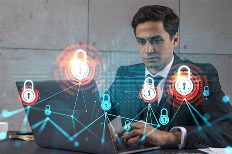 Premium Photo Businessman In Office Working With Laptop Develop Data Protection System To
