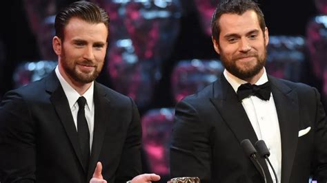 Chris Evans Catching Henry Cavill Shove His Mouth With Cookies At The Oscars Is Pure Meme Material