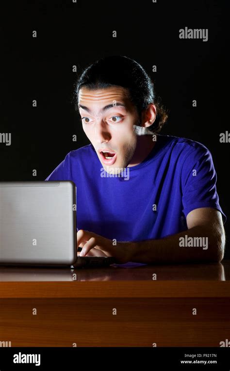 Hacker Sitting In Dark Room Stock Photo Alamy