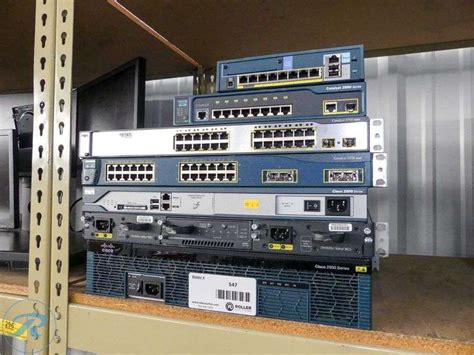 4 Cisco Network Switches 2 Cisco Routers And Cisco 2300 Power System Roller Auctions