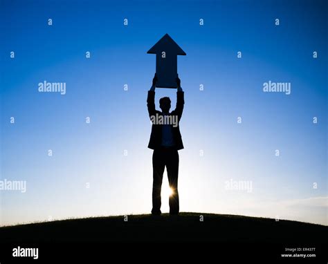 Man Holding Arrow Stock Photo Alamy