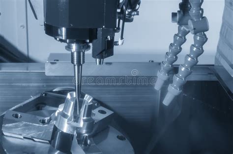 The Axis CNC Milling Machine Cutting The Automotive Part With Solid