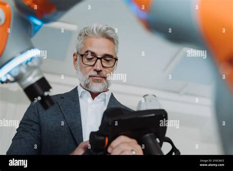 Automation Robotics Engineer Working On Robotic Knee Replacement