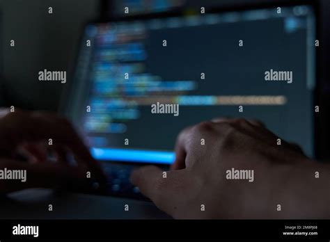 Hands Writing Code On Laptop Software And Web Development With