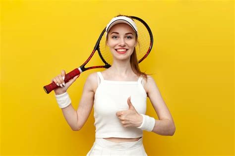 Premium Photo Tennis Player Girl In Sportswear Holds Tennis Racket