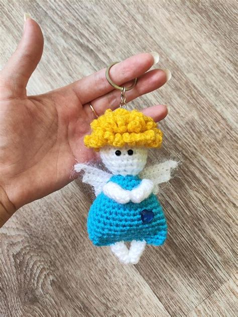 Вязана іграшка брелок — ангел ангелочок — ціна 95 грн у каталозі Брелоки Купити товари для