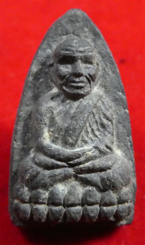 พระหลวงปู่ทวดวัดห้วยมงคล รุ่นเลื่อนสมณศักดิ์เตารีดว่านโบราณคลุกรักพิมพ์มือ ฝังตะกรุดทองแดงยันต์