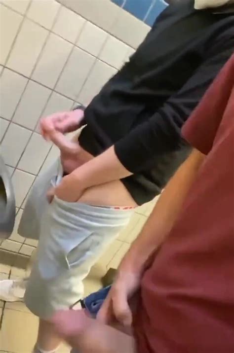 Two Young Men Jerk Off In The Toilet