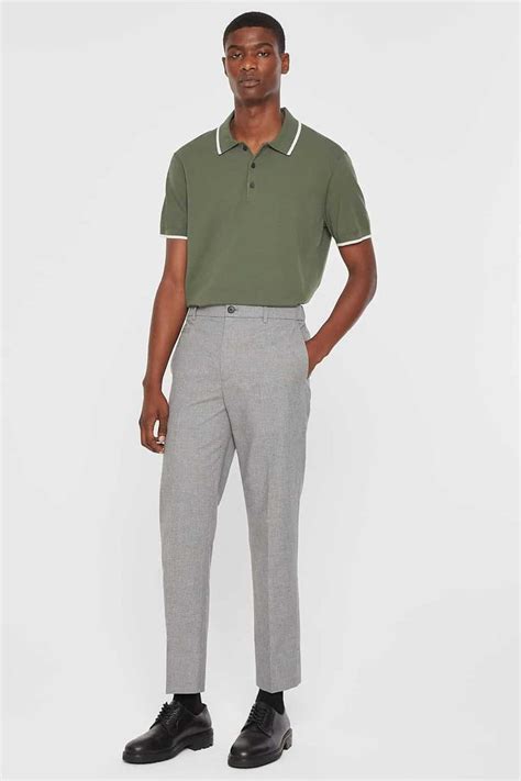 Mens Cropped Grey Trousers Green Polo Shirt Tucked In And Black Derby