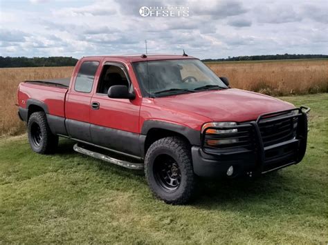 2004 Gmc Sierra 1500 With 17x9 12 Rough Country Steel Wheel And 285