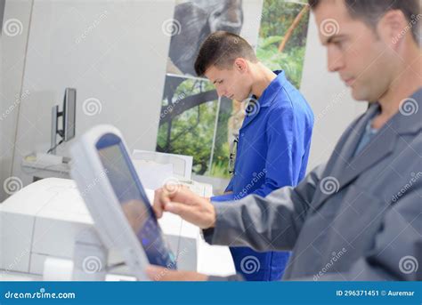 Man Entering Information Into Electronic Control Pad Stock Image Image Of Technology Profile