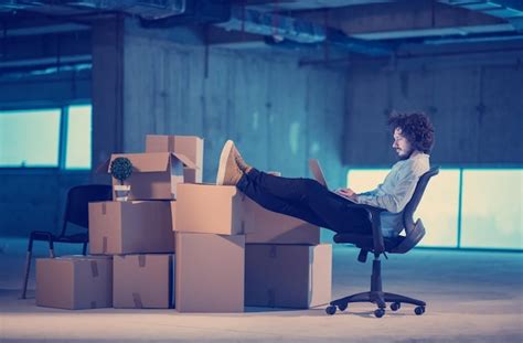 Premium Photo Young Male Architect On Construction Site Checking Documents And Business