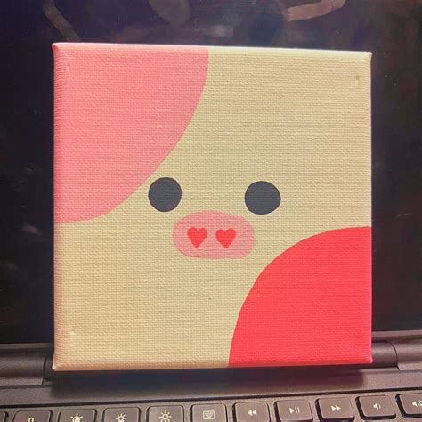 A Close Up Of A Computer Keyboard With A Pig Painted On The Front And Side