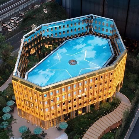 Dior Unveils Bangkok Gold House With Gleaming Golden Facade Magzoid