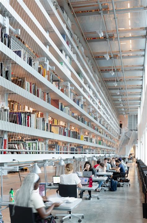 wolfgang tschapeller adds floating bookshelves to cornell university