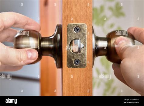 Doors Latch Have Spring Loaded Mechanism That Door Knob Turns To Release It From Door Jamb