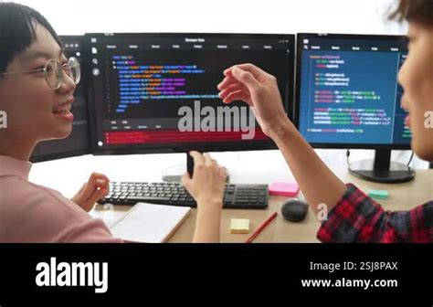 Slow Motion Back End Software Developer Engineer For Computer Programming Working Together On