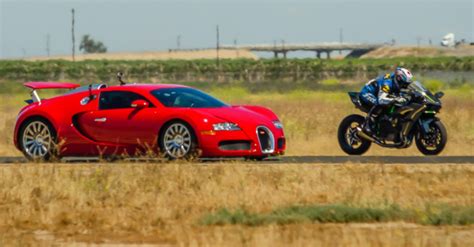 Watch What Happens When The Worlds Fastest Car Takes On The Worlds Fastest Motorcycle In Epic