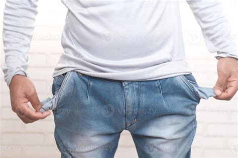 Man With Empty Pockets 2169877 Stock Photo At Vecteezy