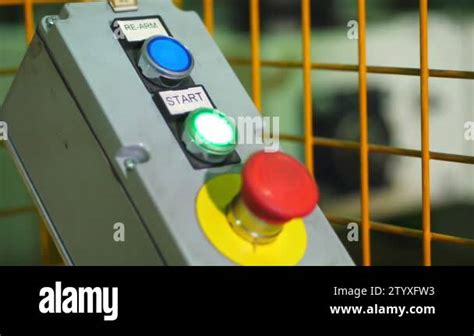 Close Up Start Or Stop Red Button For Industrial Machine Emergency Stop For Safety Concept