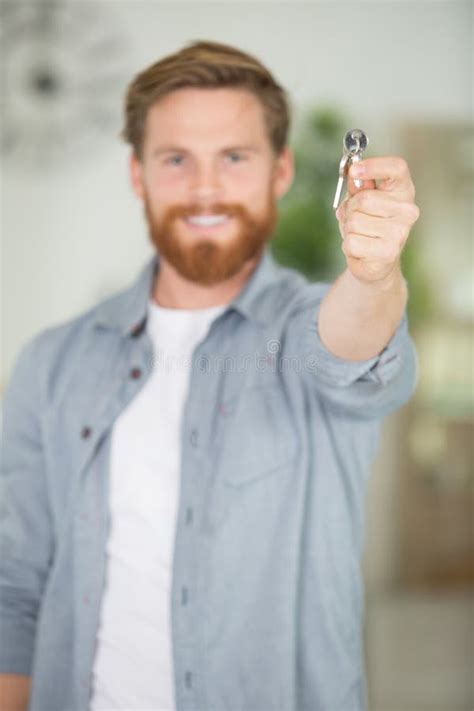 Happy Man Holding Keys Stock Image Image Of Hold Future 267510941