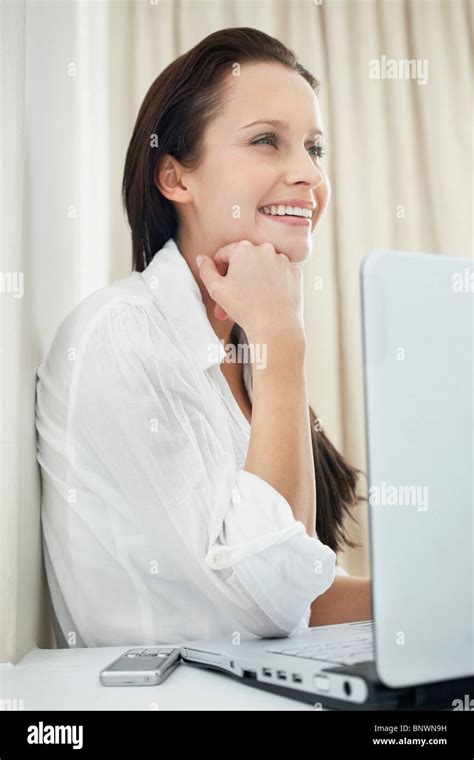 Pretty Woman Sitting In Front Of Laptop Stock Photo Alamy