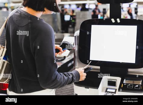 Woman Passenger Self Check In Scanning Qr Code Boarding Pass At Airport