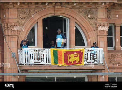 Sri Lanka Staff Hang A Sri Lankan Flag Over The Dressing Room Balcony
