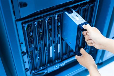 Premium Photo It Engineer Repairing A Server In A Datacenter
