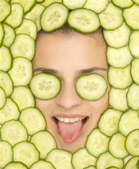 Woman Posing With Slices Of Cucumber Around Her Face Stock Image Image Of Satisfied Slice