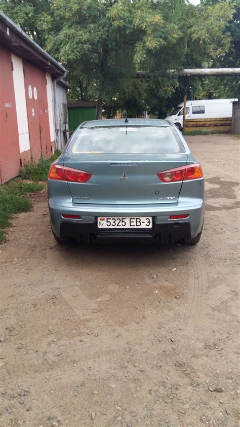 Диффузор на задний бампер под раздвоенный выхлоп) — Mitsubishi Lancer X ...