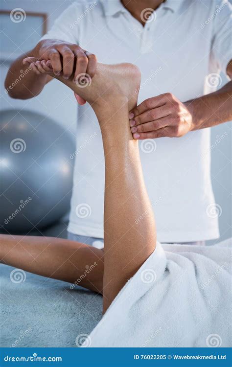 Woman Receiving Foot Massage From Physiotherapist Stock Image Image