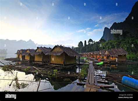 Floating Raft House Reflection On Water In Khao Sok National Park Surat