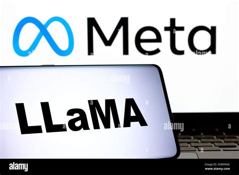 LLaMA Letters Seen On Smartphone And Blurred Meta Company Logo On