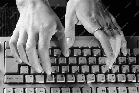 premium photo women s gentle hands typing on a keyboard