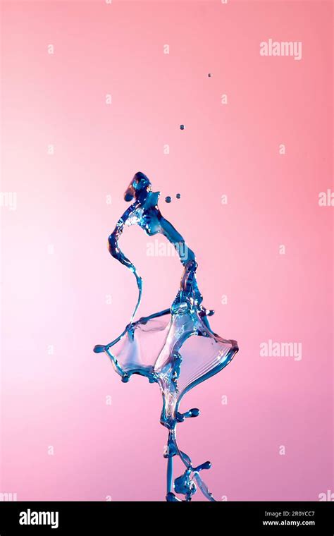 Abstract Background Of A Splash Of Colored Water Collision Of Colored Drops Falling Towards